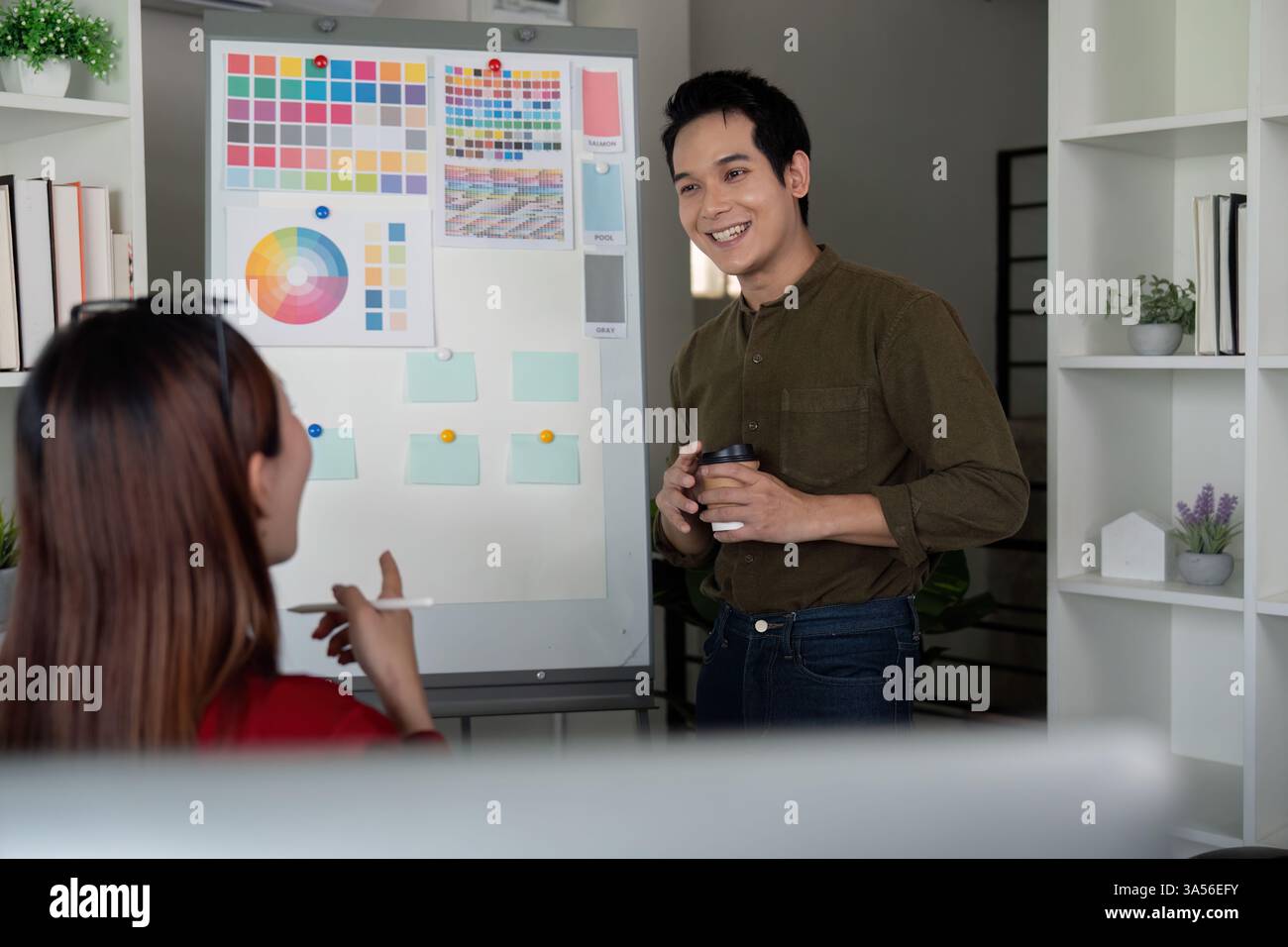 Team Collaboration and Creativity. A graphic design team brainstorming ...