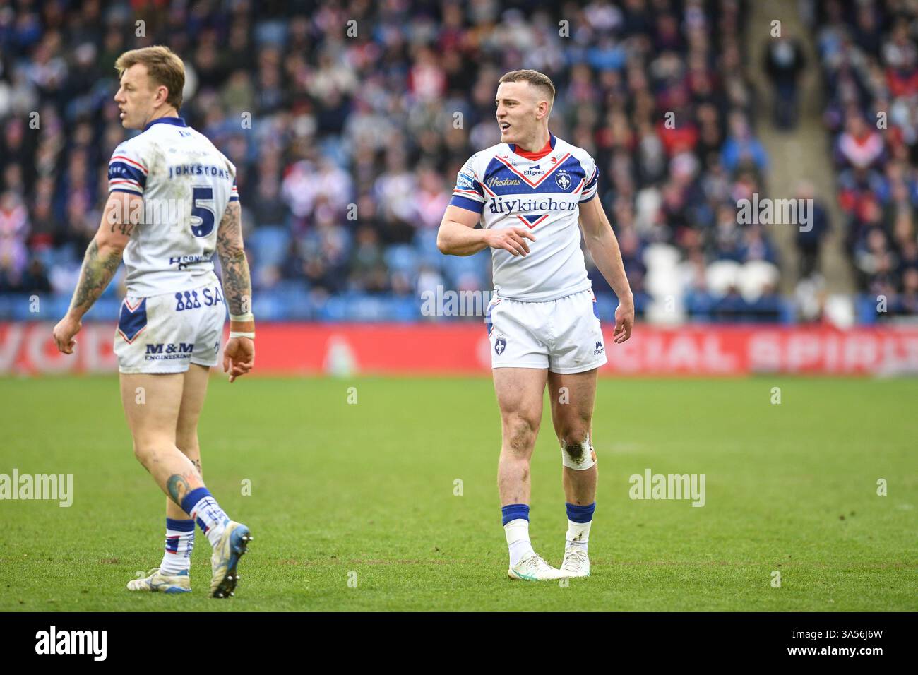 Huddersfield, England - 16th March 2025 - Wakefield Trinity's Tom Johnstone and Jake Trueman ...