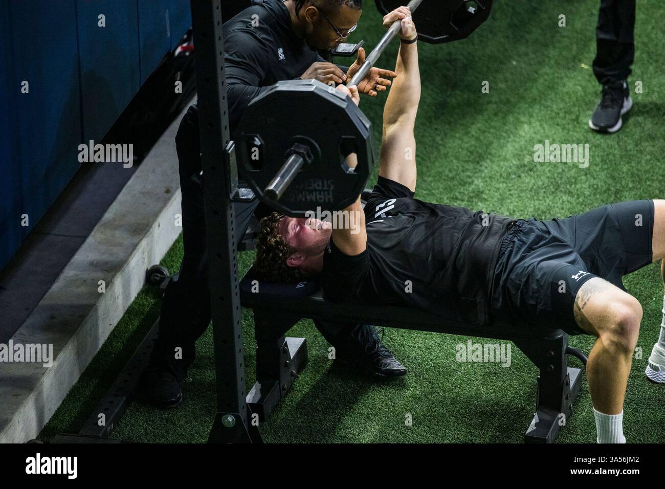 Utah's Caleb Lohner lifts weights during the Big 12 Conference's NFL ...
