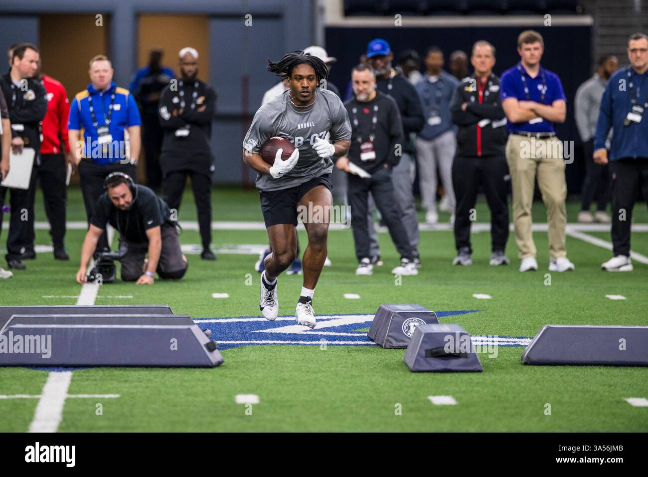 Kansas State's DJ Giddens runs a drill during the Big 12 Conference's ...