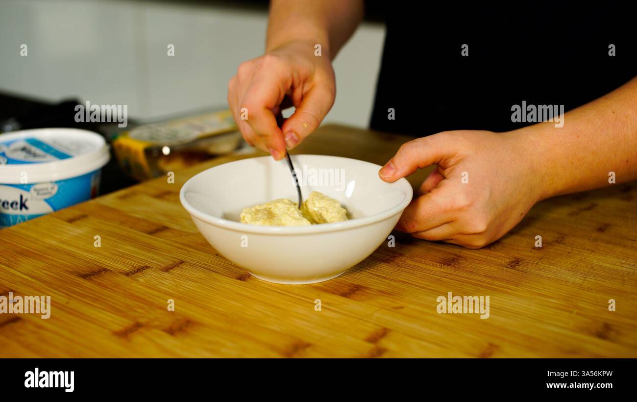 Mixing sandwich salad dressing hi-res stock photography and images - Alamy
