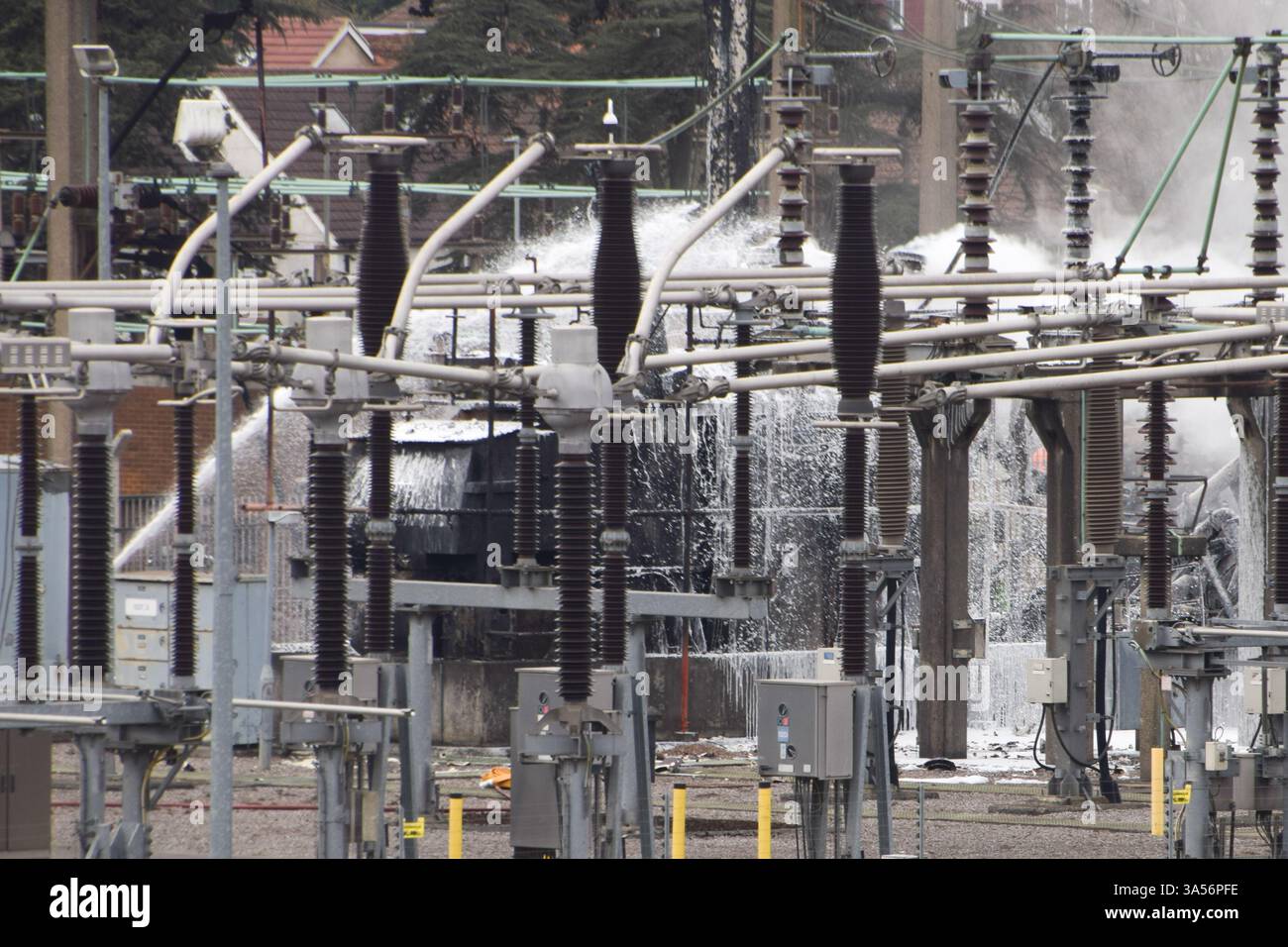 March 21, 2025, London, England, UK: Firefighters spray the structure ...
