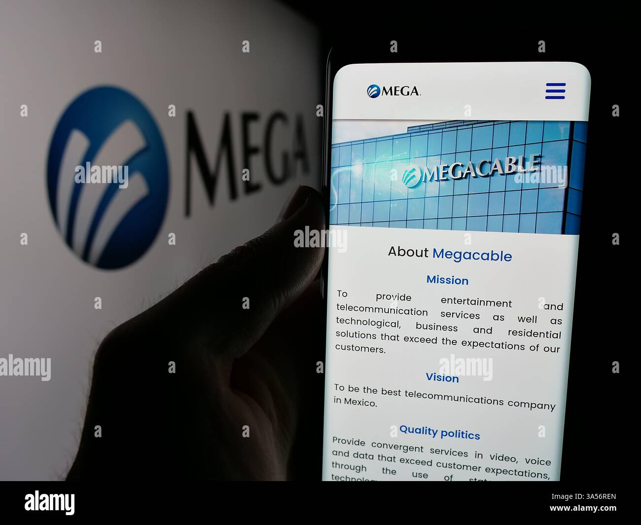 Stuttgart, Germany - 11-11-2024: Person holding cellphone with webpage ...