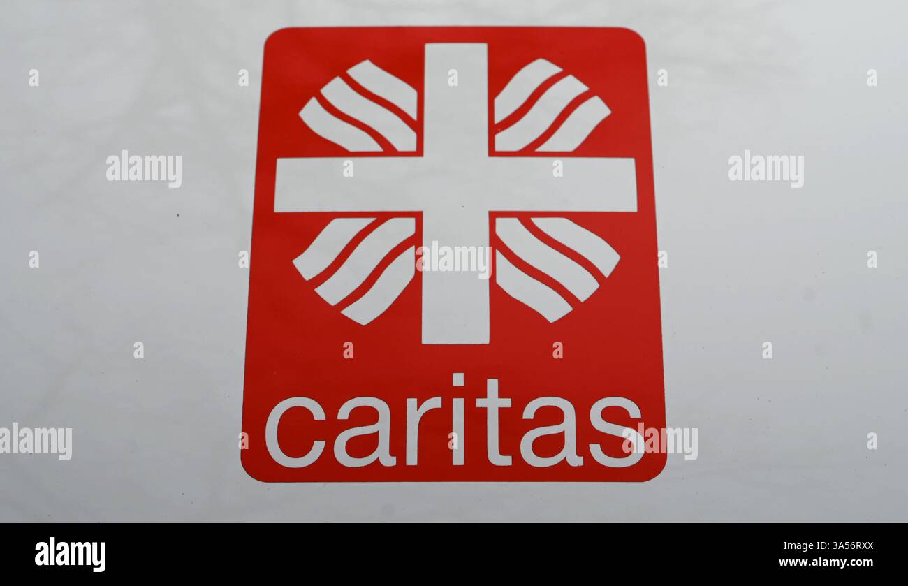 Munich, Germany. 21st Mar, 2025. A sign with the Caritas logo Credit: Leonie Asendorpf/dpa/Alamy ...