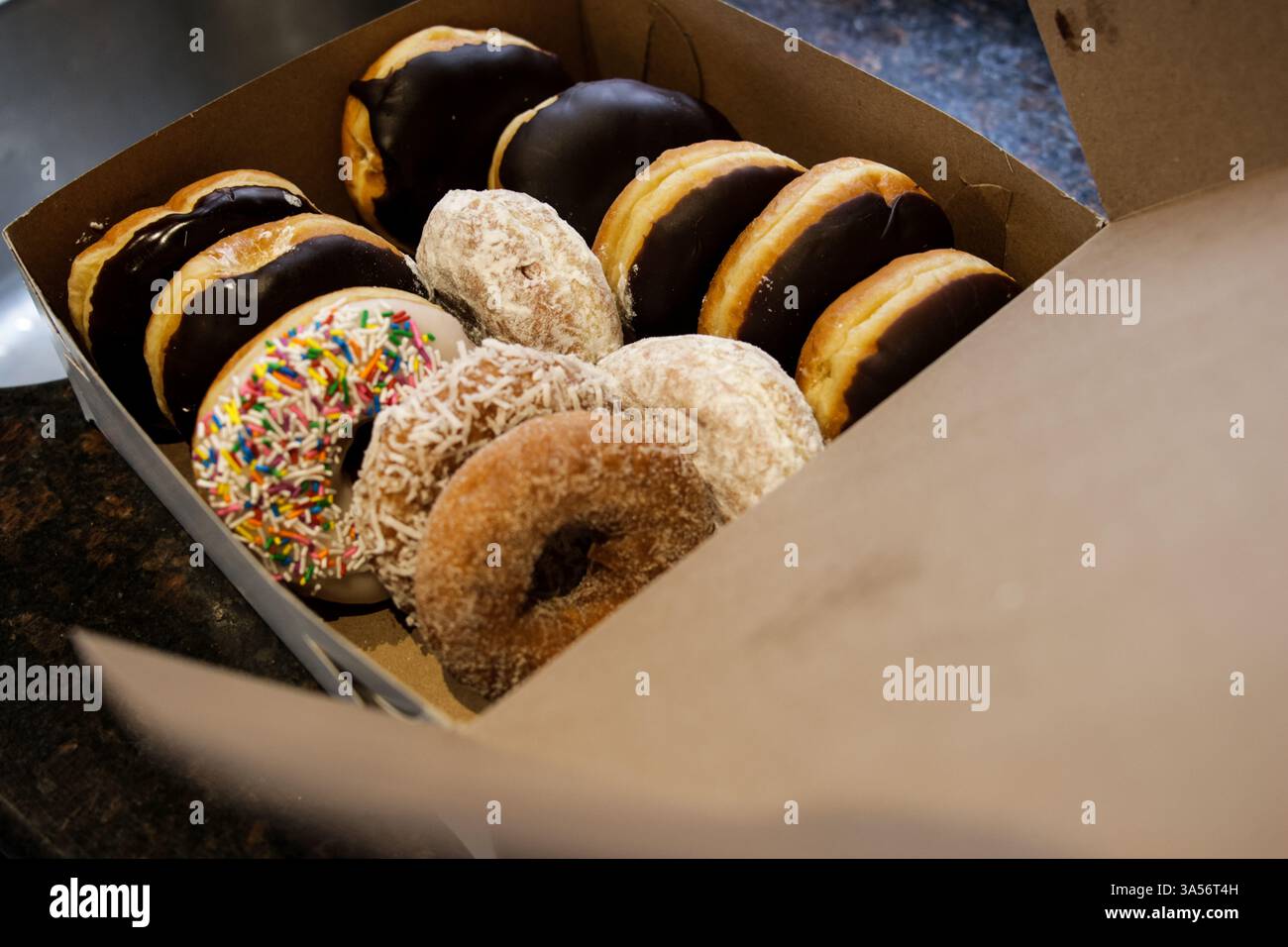 Fresh baked assorted donuts hi-res stock photography and images - Alamy