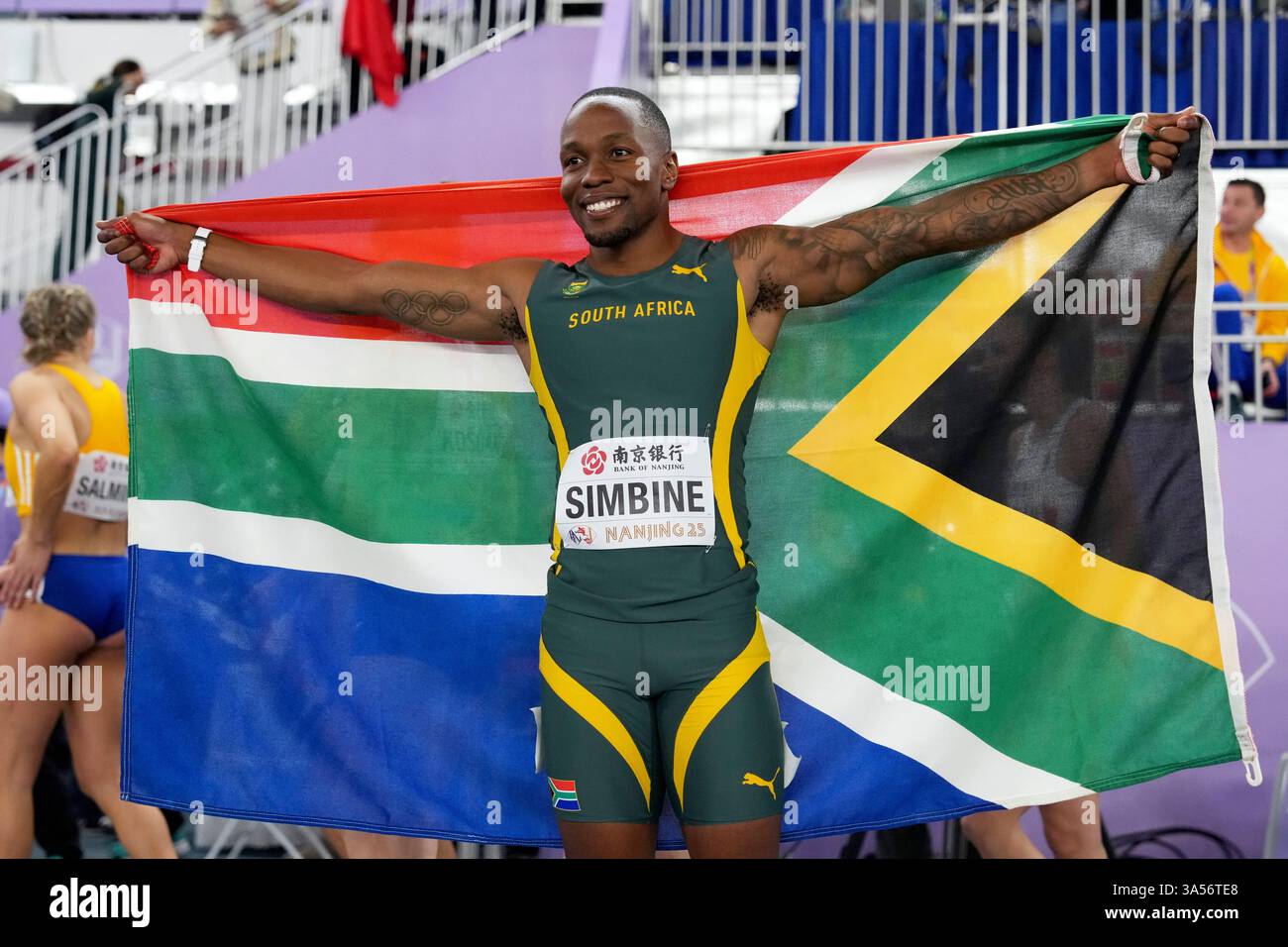 Akani Simbine, of South Africa, poses after winning the bronze medal in ...