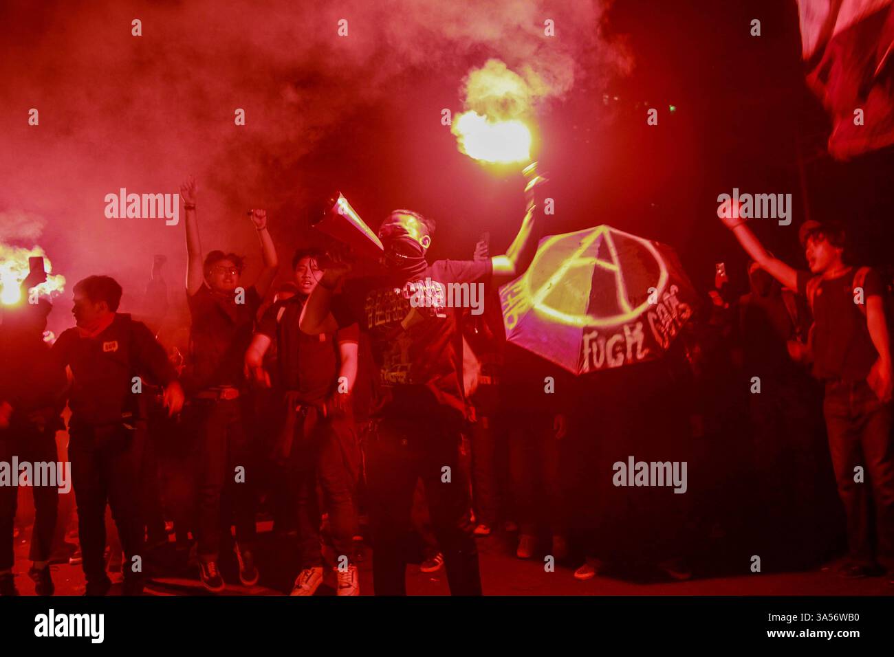 REJECTION ACTION OF THE MILITARY LAW Protesters light flares during a ...