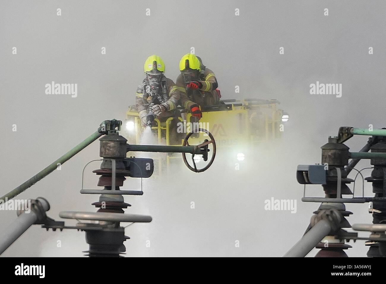 Firefighters extinguish the fire at the North Hyde electrical ...
