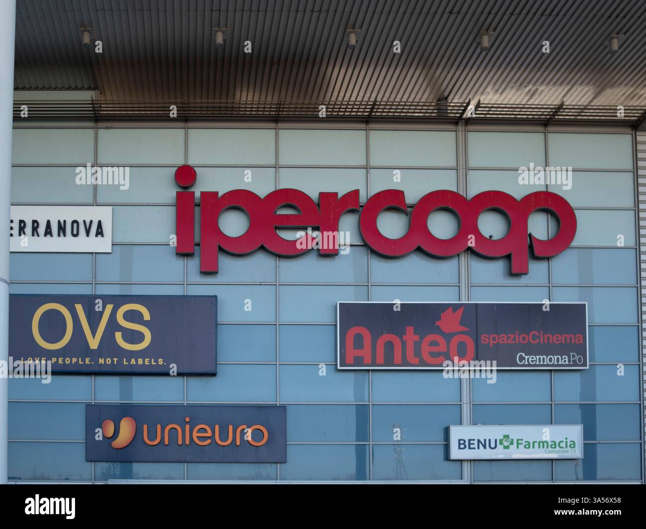 Different brands logos on a shopping mall facade, including Ipercoop ...