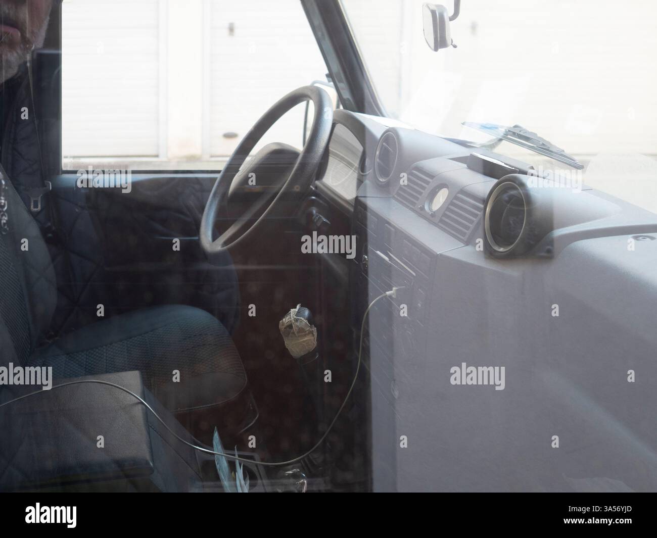 Cremona, Italy March 15th 2025 Man driving Land Rover Defender 90 from ...