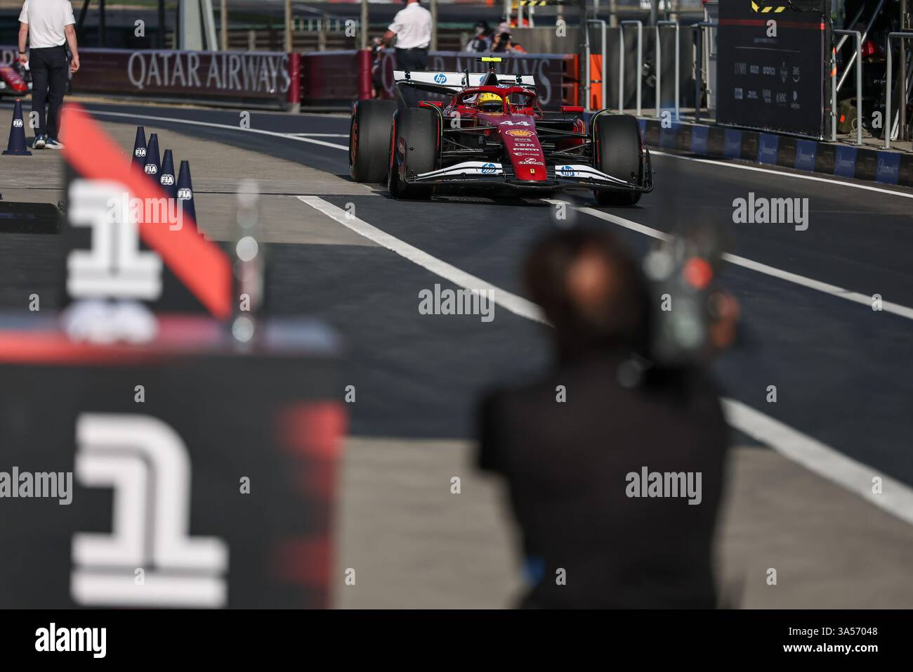 SHANGHAI, CHINA- MARCH 21: Lewis Hamilton of Great Britain and Scuderia ...