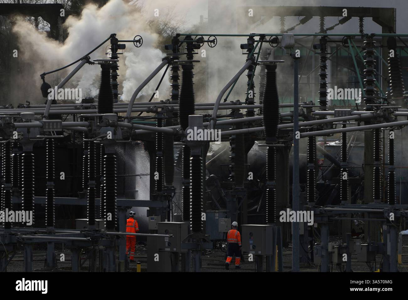 Smoke rises from the North Hyde electrical substation, which caught ...