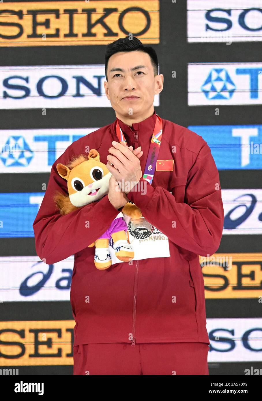 Nanjing, China's Jiangsu Province. 21st Mar, 2025. Zhu Yaming of China reacts during the ...