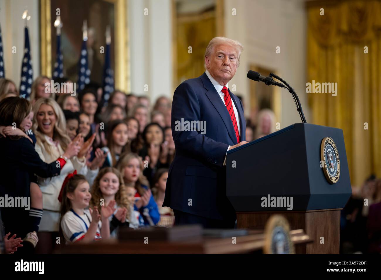 President Donald Trump - surrounded by women and girls - delivers ...