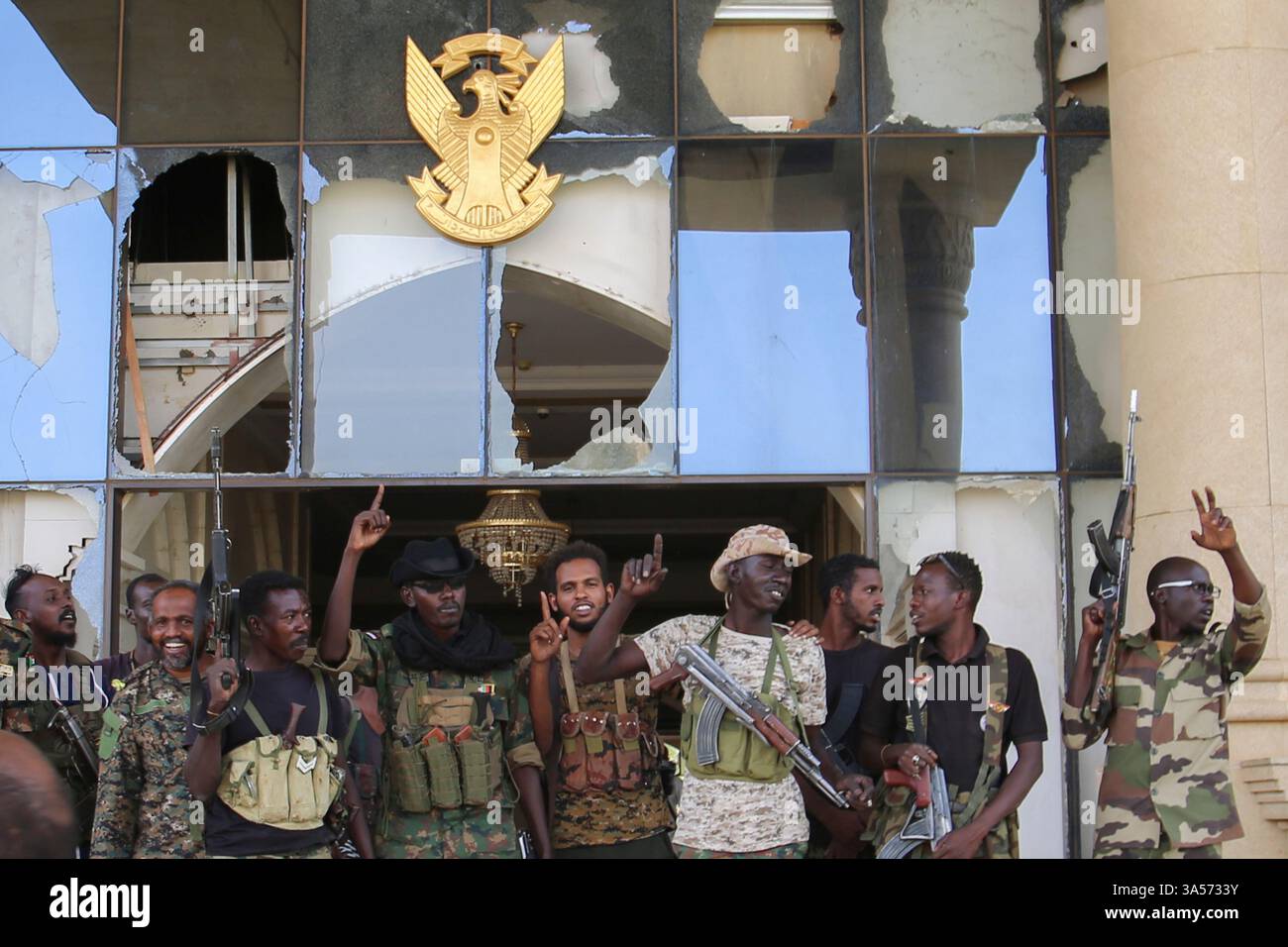 Sudan army soldiers celebrate after they took over the Republican ...