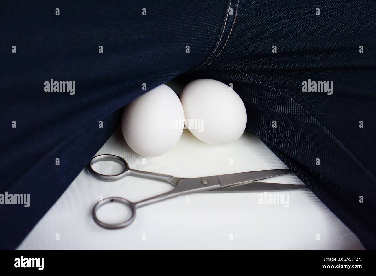 Close-up of male reproductive organs near the groin area, representing ...