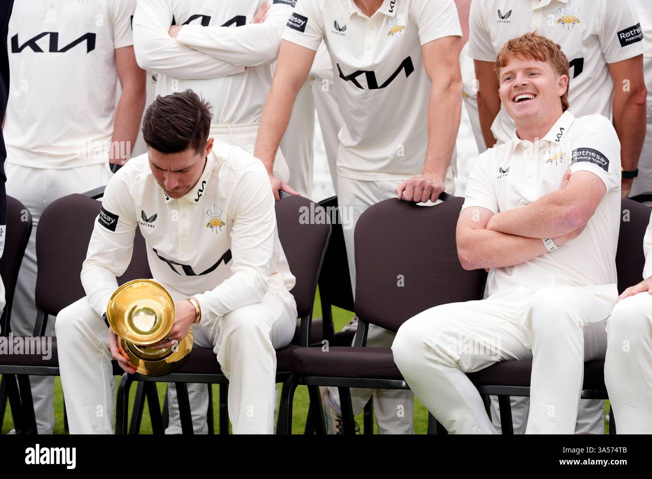 Surrey’s captain Rory Burns (left) looks at the County Championship ...