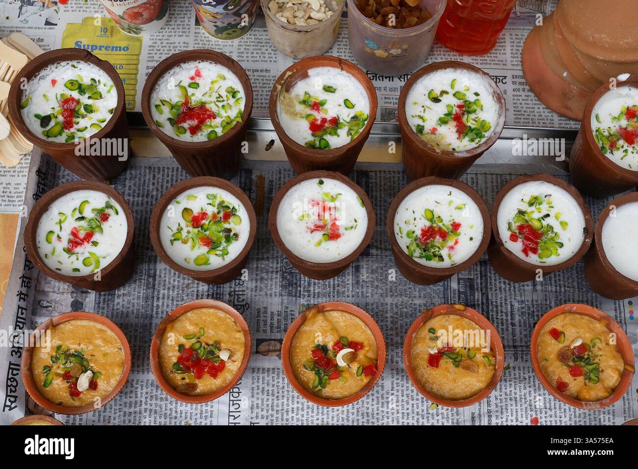 Pots of lassi at a food stall in Varanasi, Uttar Pradesh, India Stock ...