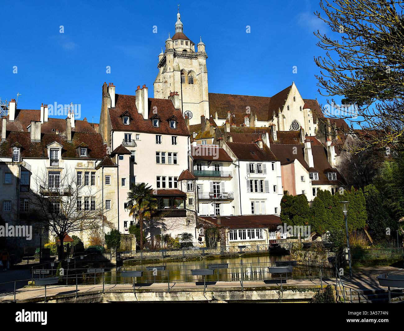 The Collegiate Church of Notre-Dame above the houses of the town of ...