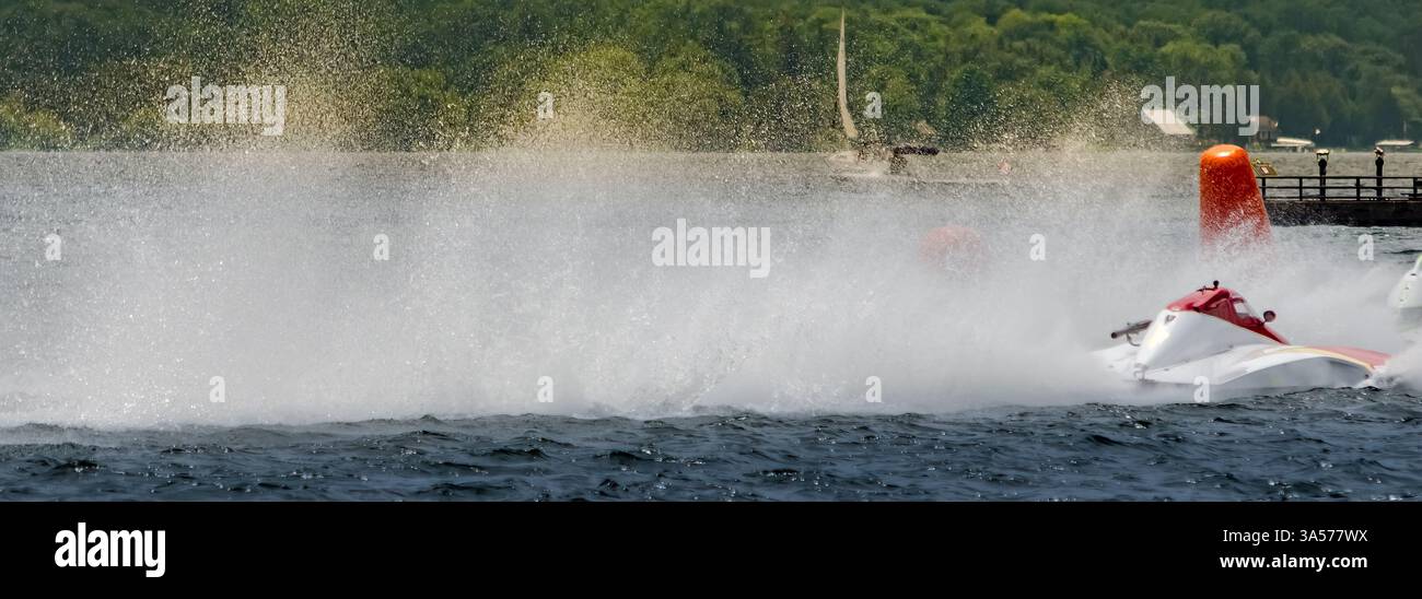 Panorama of a hydroplane racing boat's rooster tail of spray as it's ...