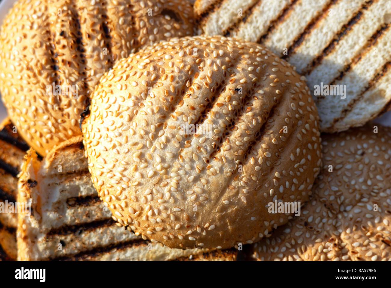 grilled burger bread buns, top view Stock Photo - Alamy