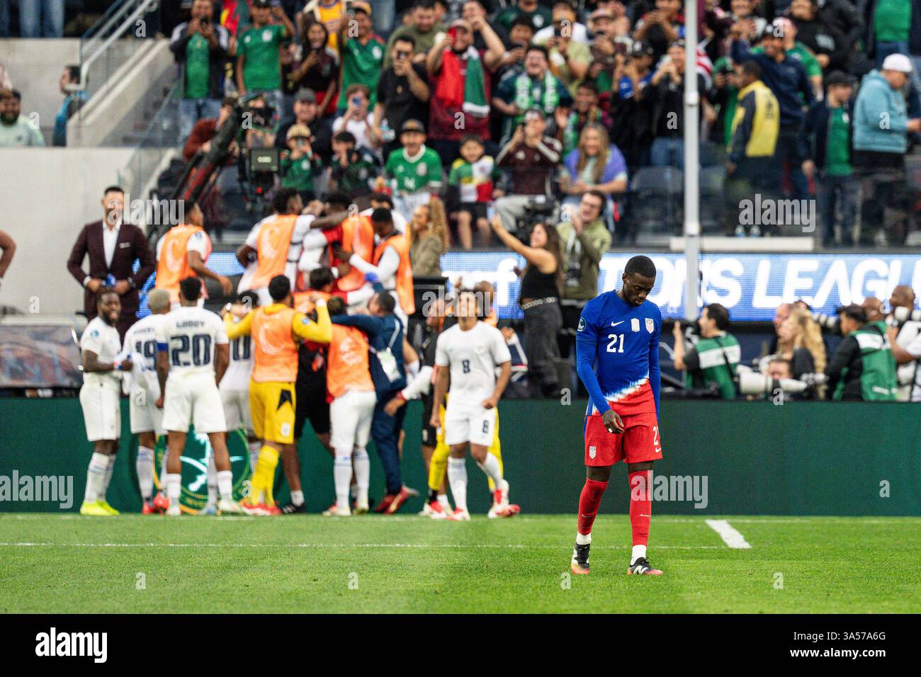 United States forward Timothy Weah (21) reacts to a goal by Panama ...