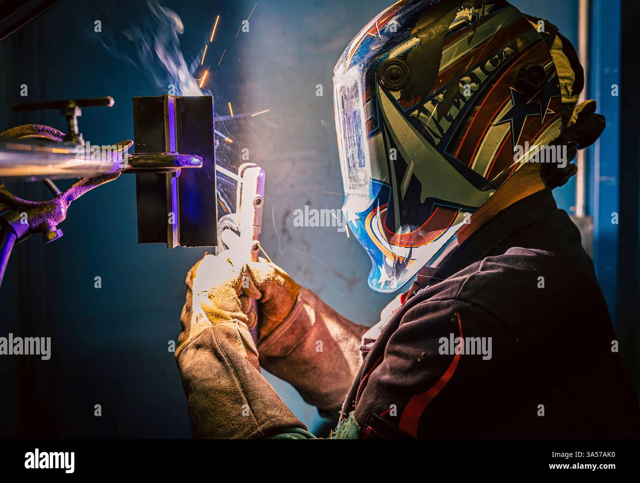 Pfc. Raven K. Douds welds two metal pieces together during training at ...