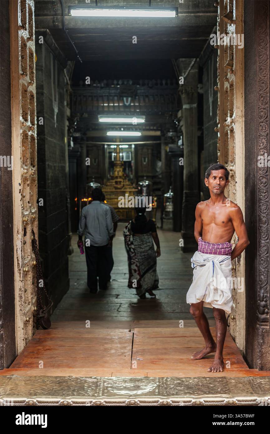 Indian brahmin traditional Hindu society priest standing in gateway of ...