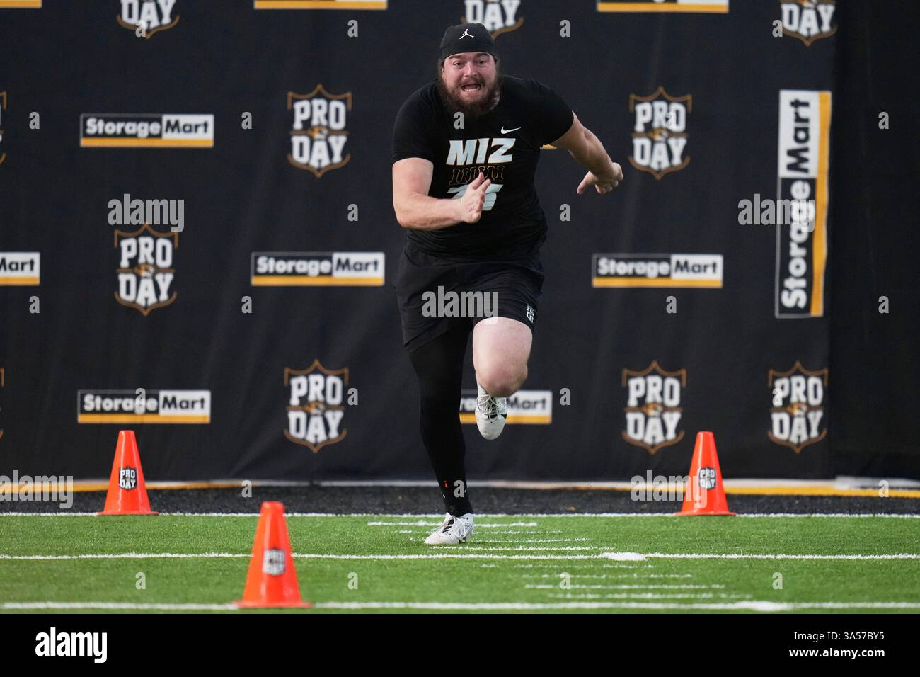 Missouri offensive lineman Mitchell Walters runs the 40-yard dash ...