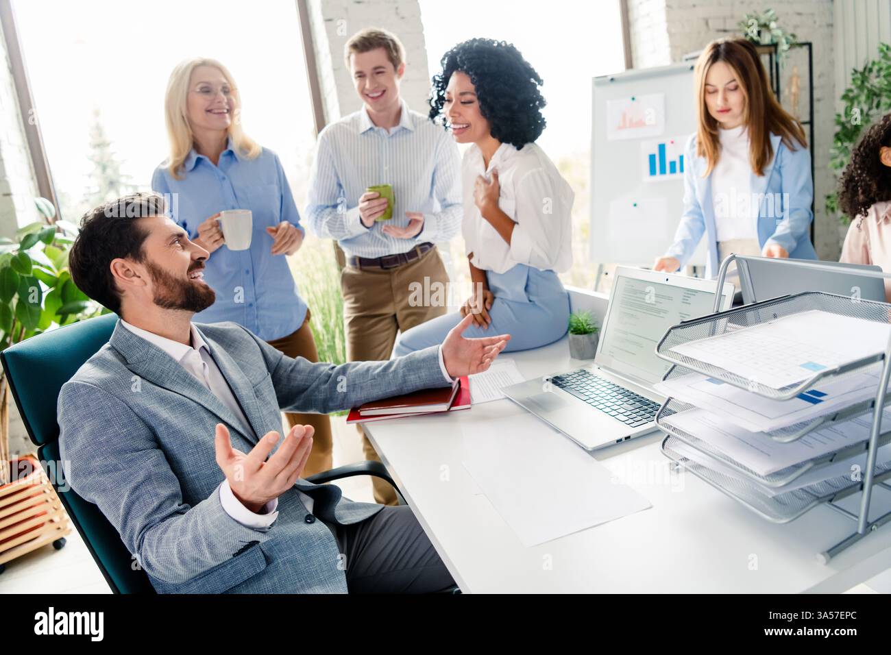 Business team engaging in lively collaboration at modern office environment Stock Photo - Alamy