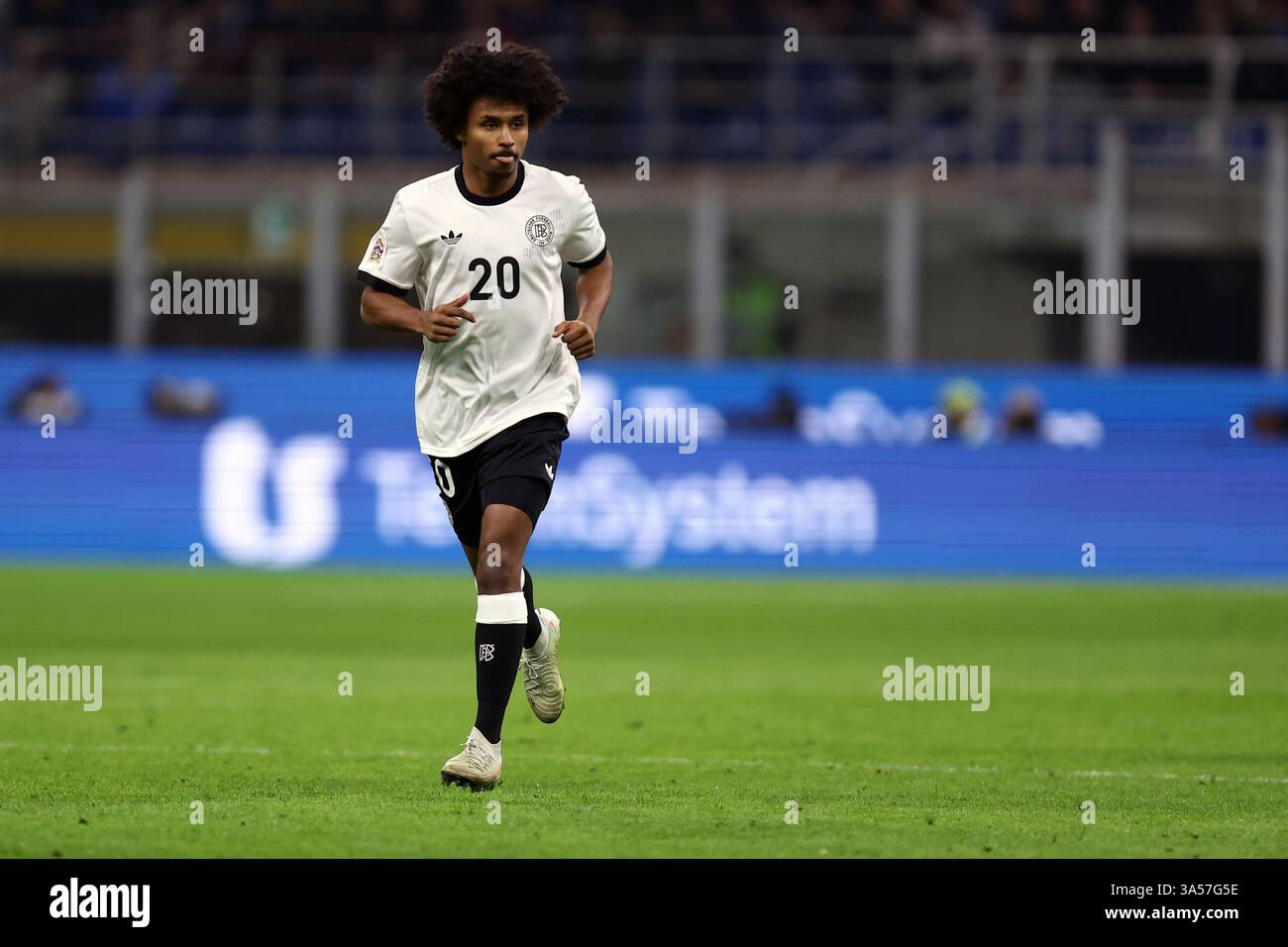 Milano, Italy. 20th Mar, 2025. Karim Adeyemi of Germany looks on during ...