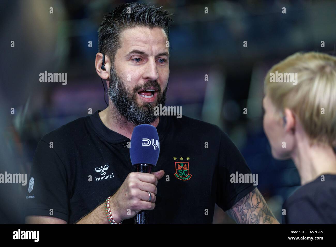 21 March 2025, Saxony-Anhalt, Magdeburg: Handball: Bundesliga, SC Magdeburg - Füchse Berlin ...