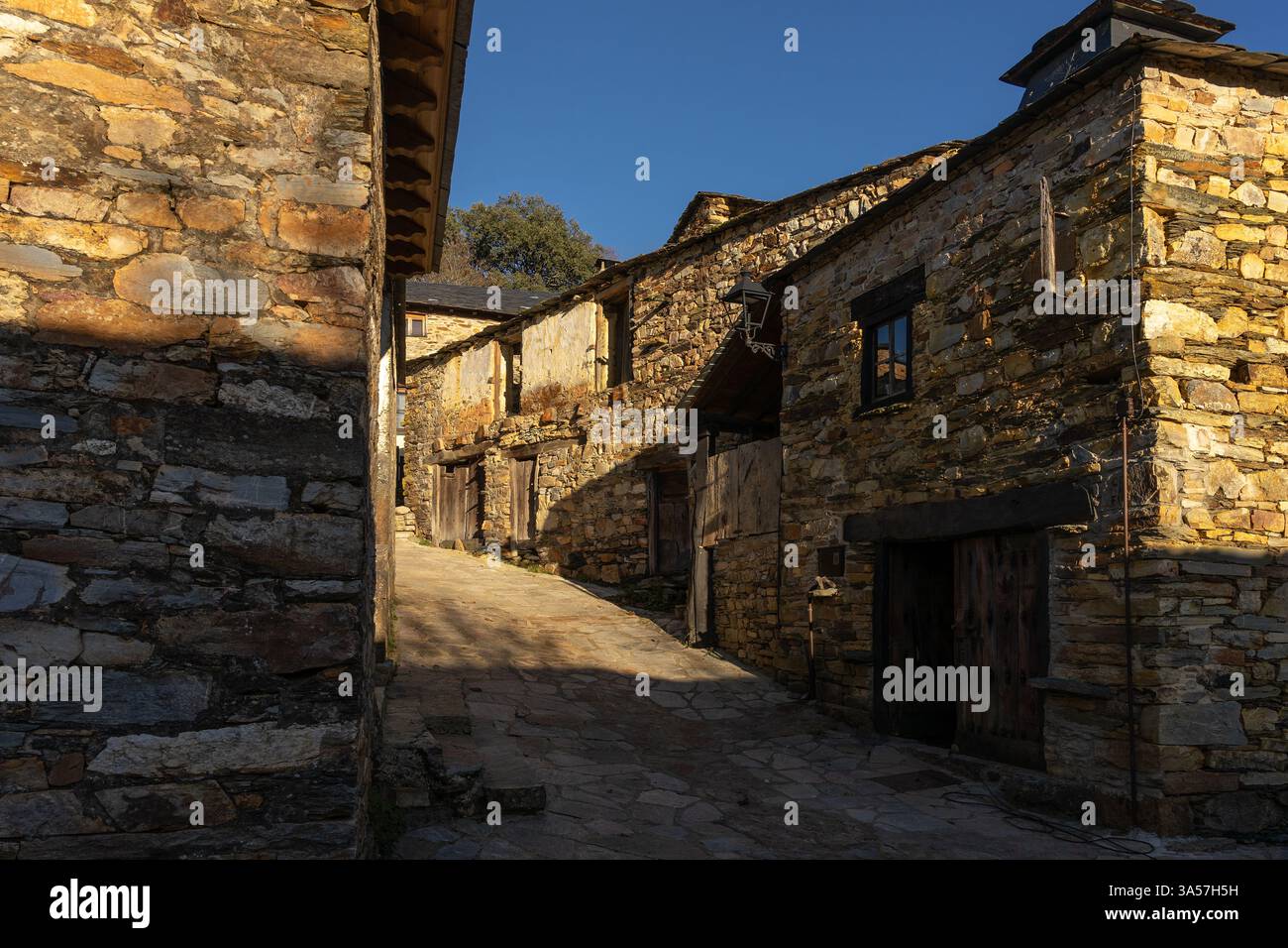 Beautiful village of Santa Cruz de los Cuerragos with the traditional ...