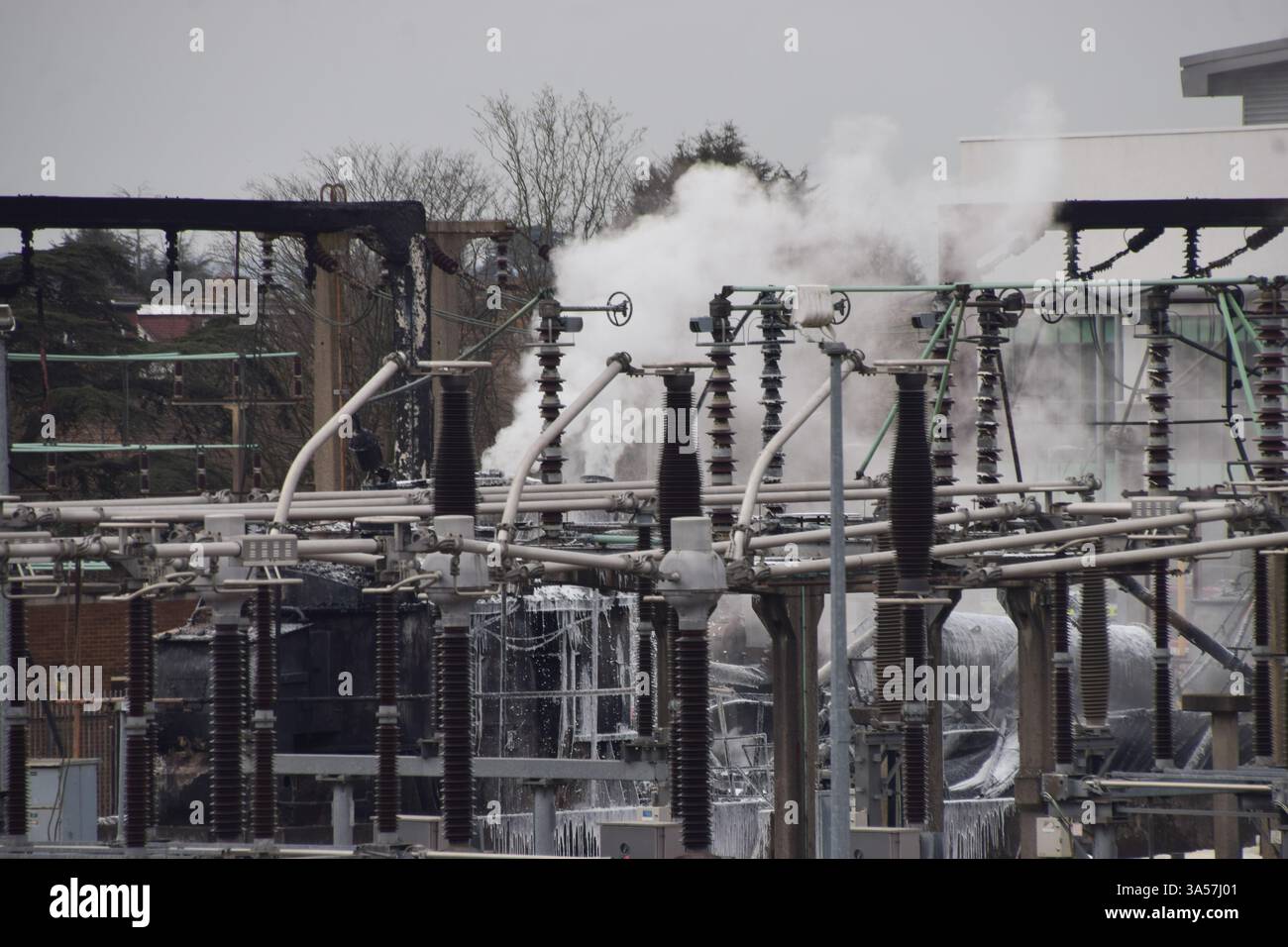 March 21, 2025, London, England, UK: Firefighters spray the structure ...