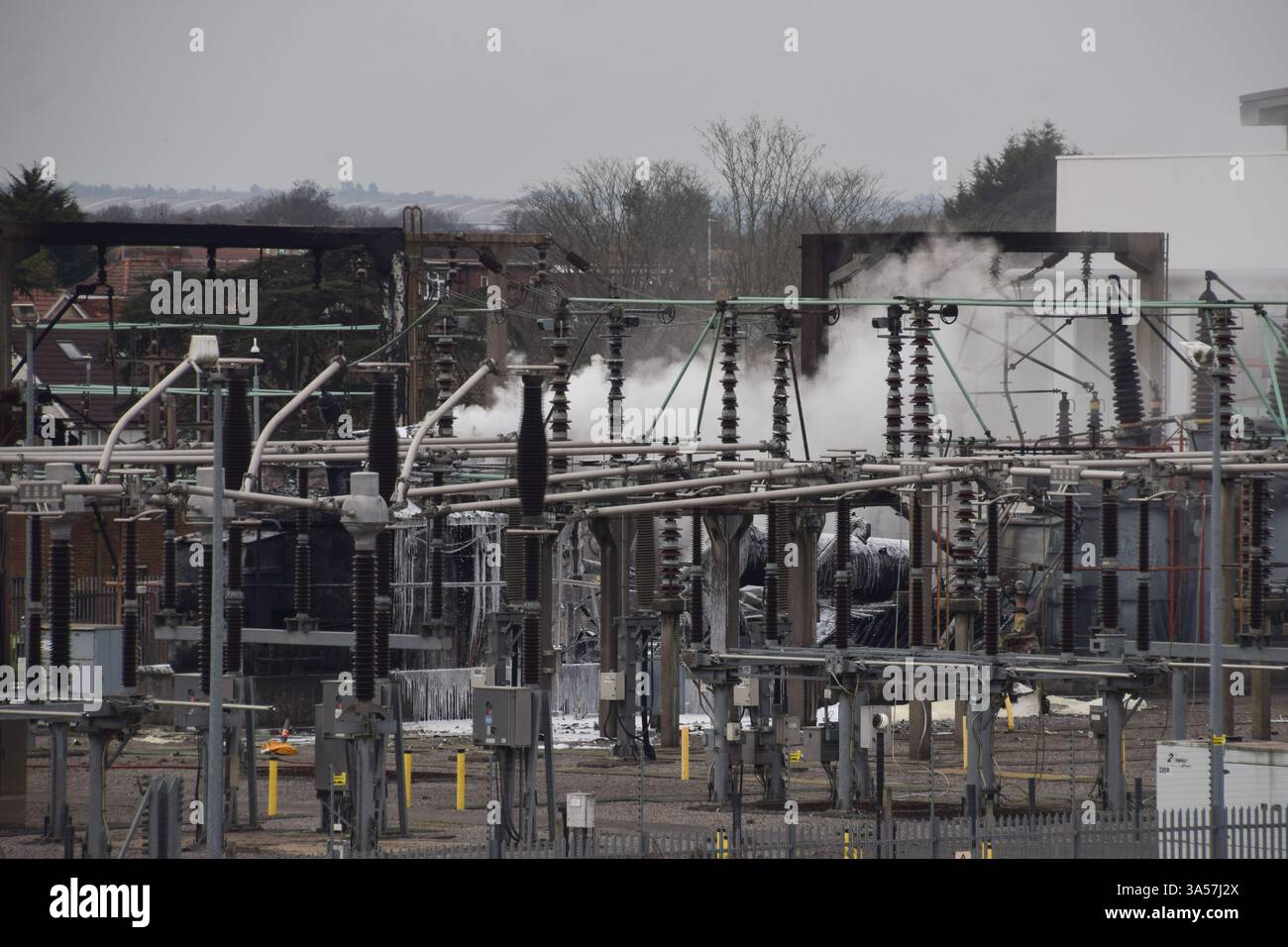 London, England, UK. 21st Mar, 2025. Firefighters spray the structure ...