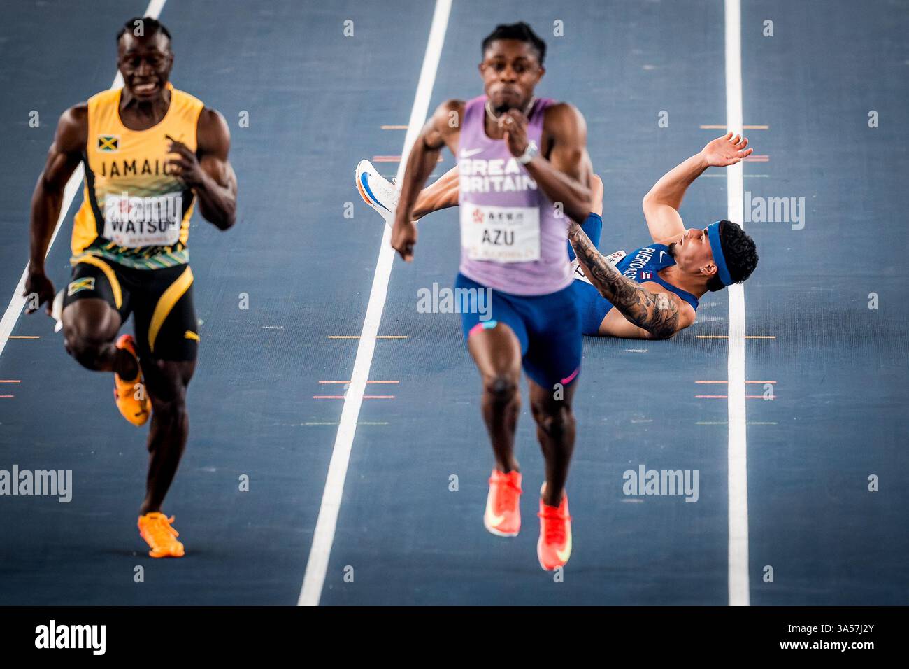 Nanjing, China. 21st Mar, 2025. (L-R) Rohan Watson of Jamaica and ...