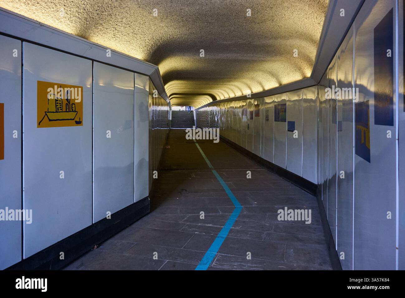 19 mar 2025 - LondonUK : View through a subway with overhead lighting ...