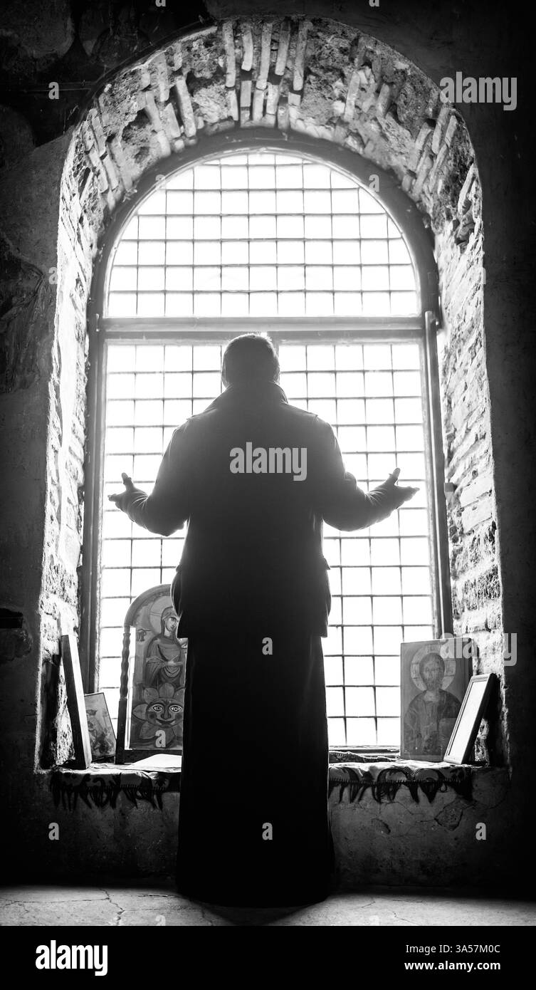 Happy person praying in catholic church hi-res stock photography and ...