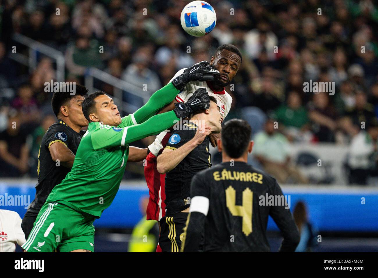 Mexico goalkeeper Luís Malagón (1) punches out a corner kick during a ...