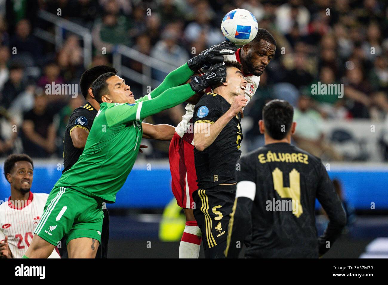 Mexico goalkeeper Luís Malagón (1) punches out a corner kick during a ...