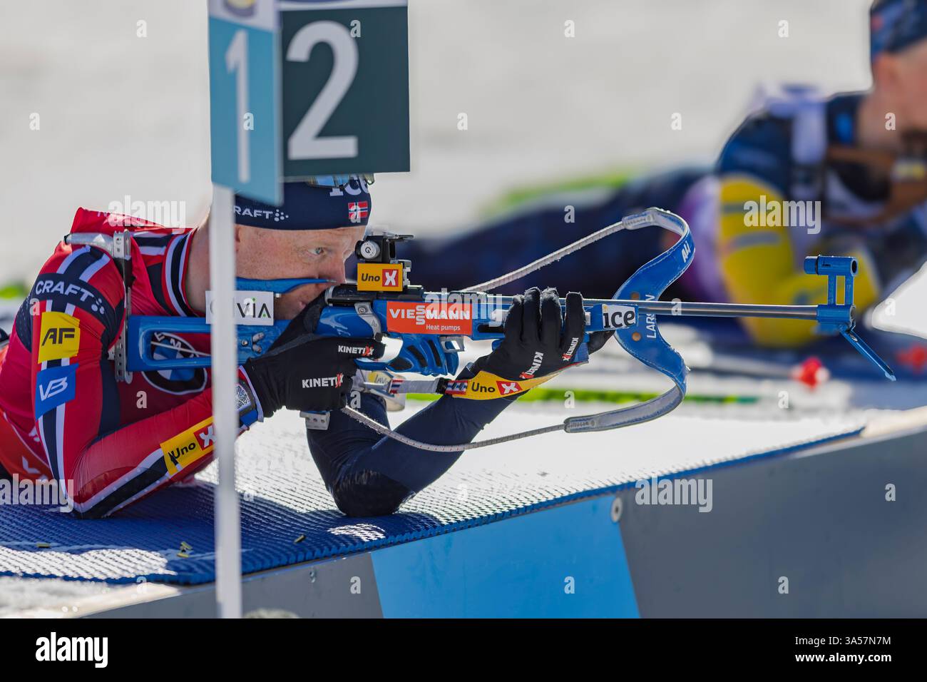 Oslo, Norway 21 March Johannes Thingnes Bo of Norway shoots in the prone position at the men ...
