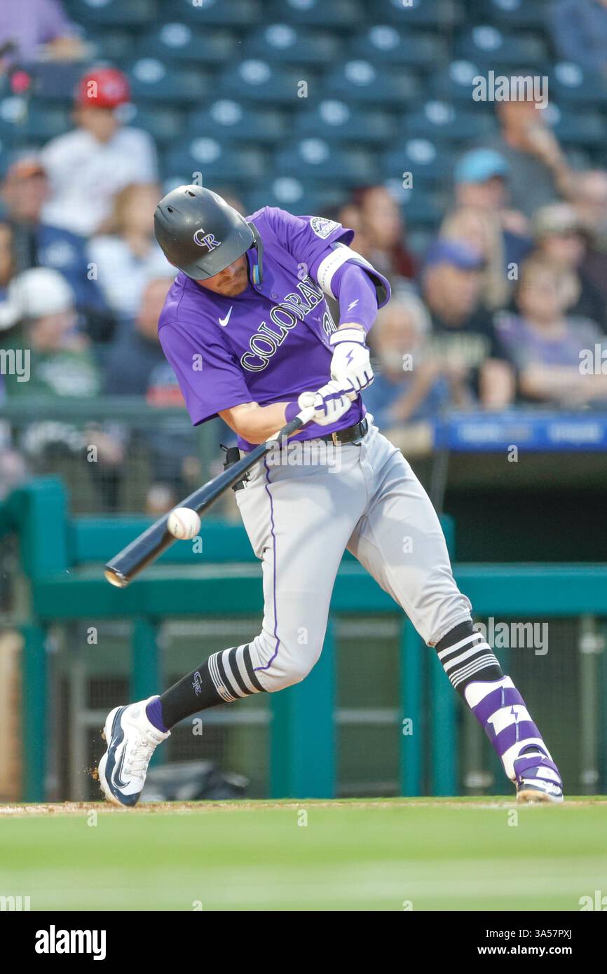 Surprise, AZ. USA; Colorado Rockies shortstop Aaron Schunk (30) grounds ...