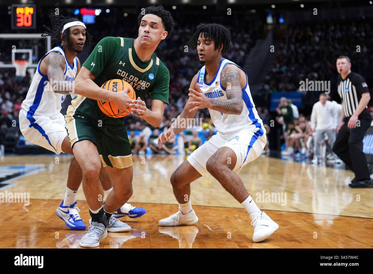 Colorado State guard Jalen Lake, center, tries to keep possession ...