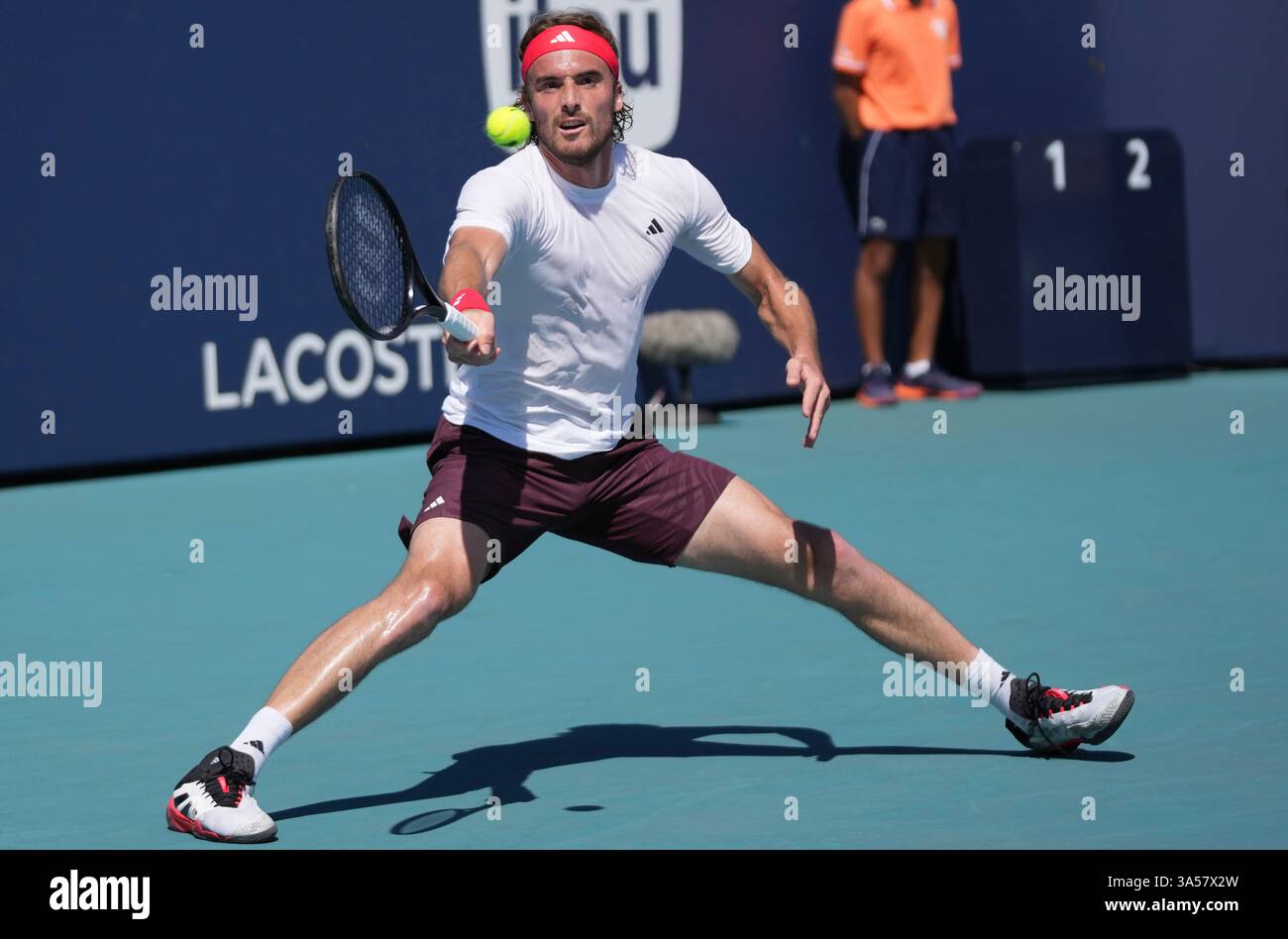 Stefanos Tsitsipas, of Greece, hits a return to Chun-Hsin Tseng, of ...