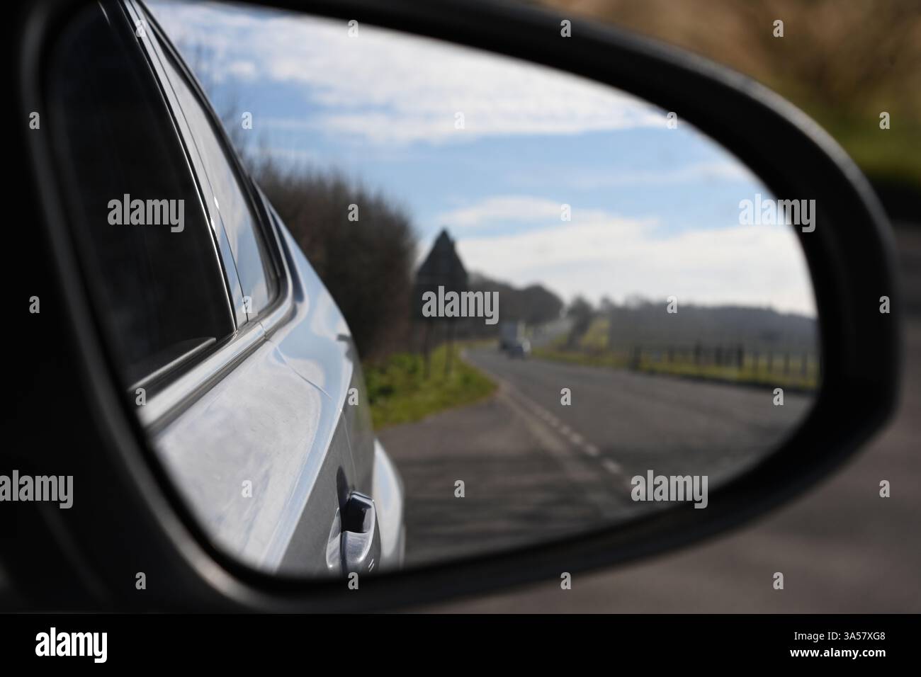 wing mirror looking back concept Stock Photo - Alamy