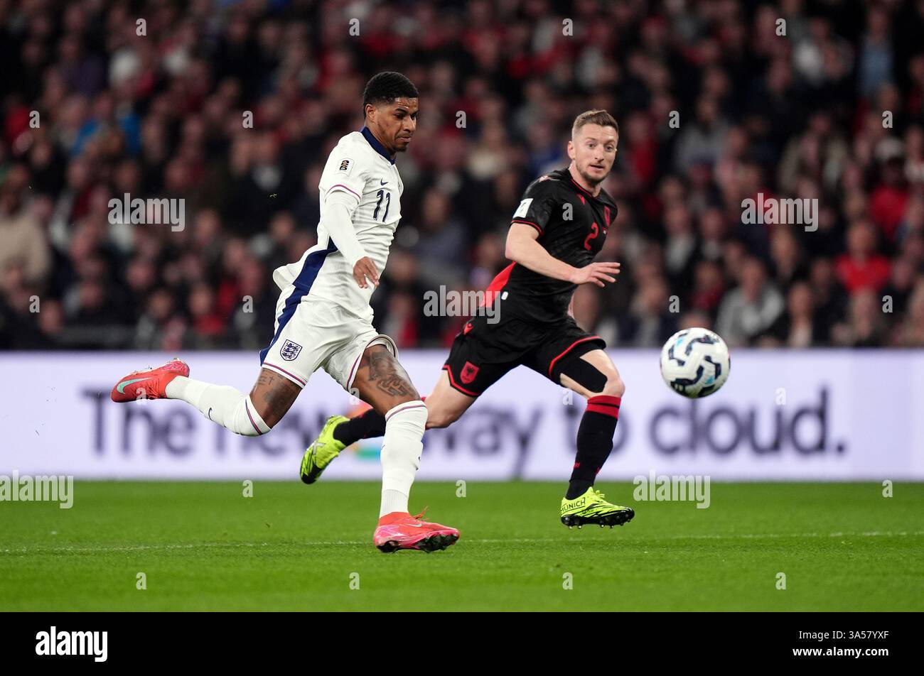 England's Marcus Rashford and Albania's Ivan Balliu (right) during the ...