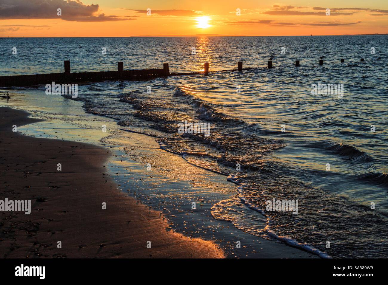 Sunset, Colwell Bay, Isle of Wight, England, UK Stock Photo - Alamy