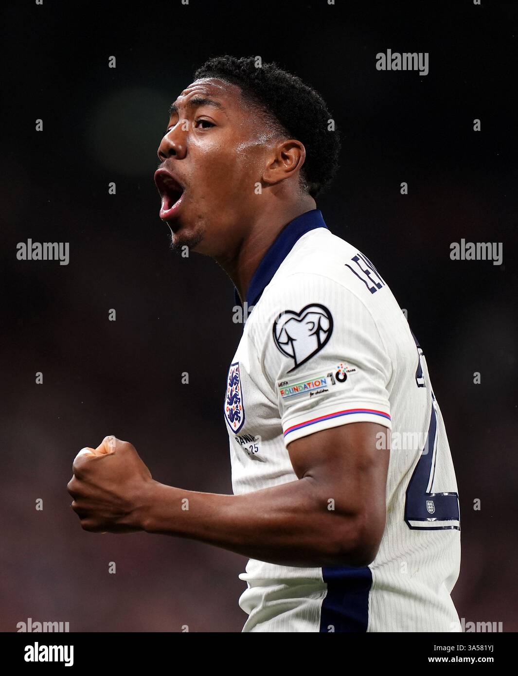 England's Myles Lewis-Skelly celebrates scoring their side's first goal ...