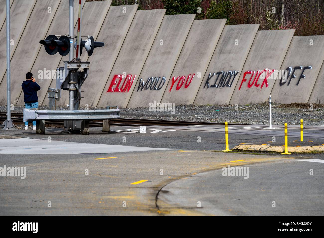 Seattle, USA. 21st Mar 2025. Anti Elon Musk graffiti on the Seattle ...
