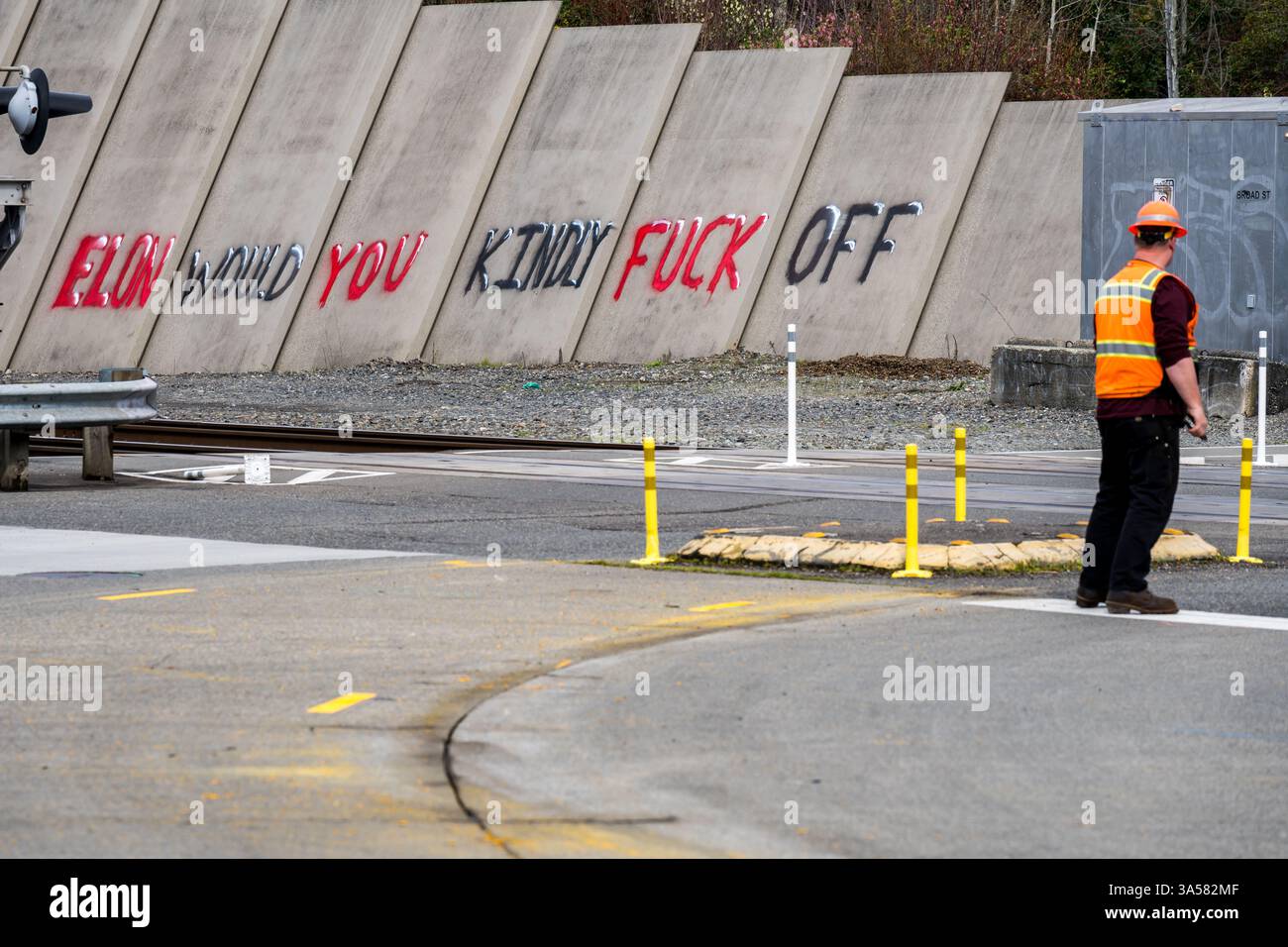 Seattle, USA. 21st Mar 2025. Anti Elon Musk graffiti on the Seattle ...